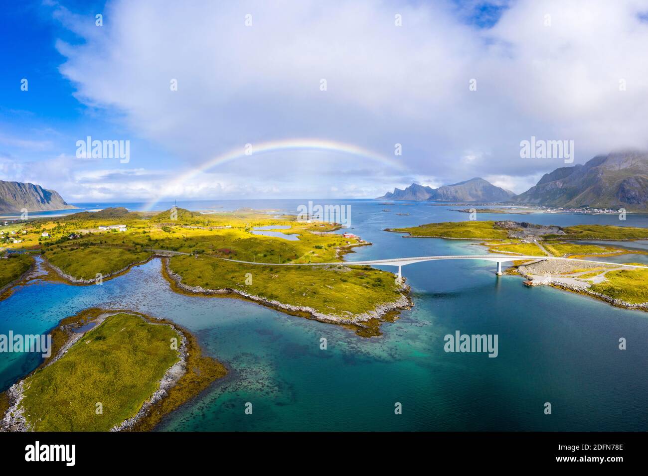 Rainbow over fjord, bridge at Fredvang, Ramberg, Lofoten, Norway Stock ...
