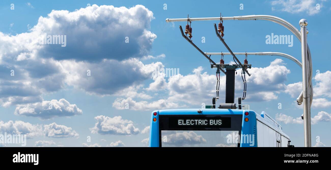 Electric bus at a stop is charged by pantograph Stock Photo - Alamy