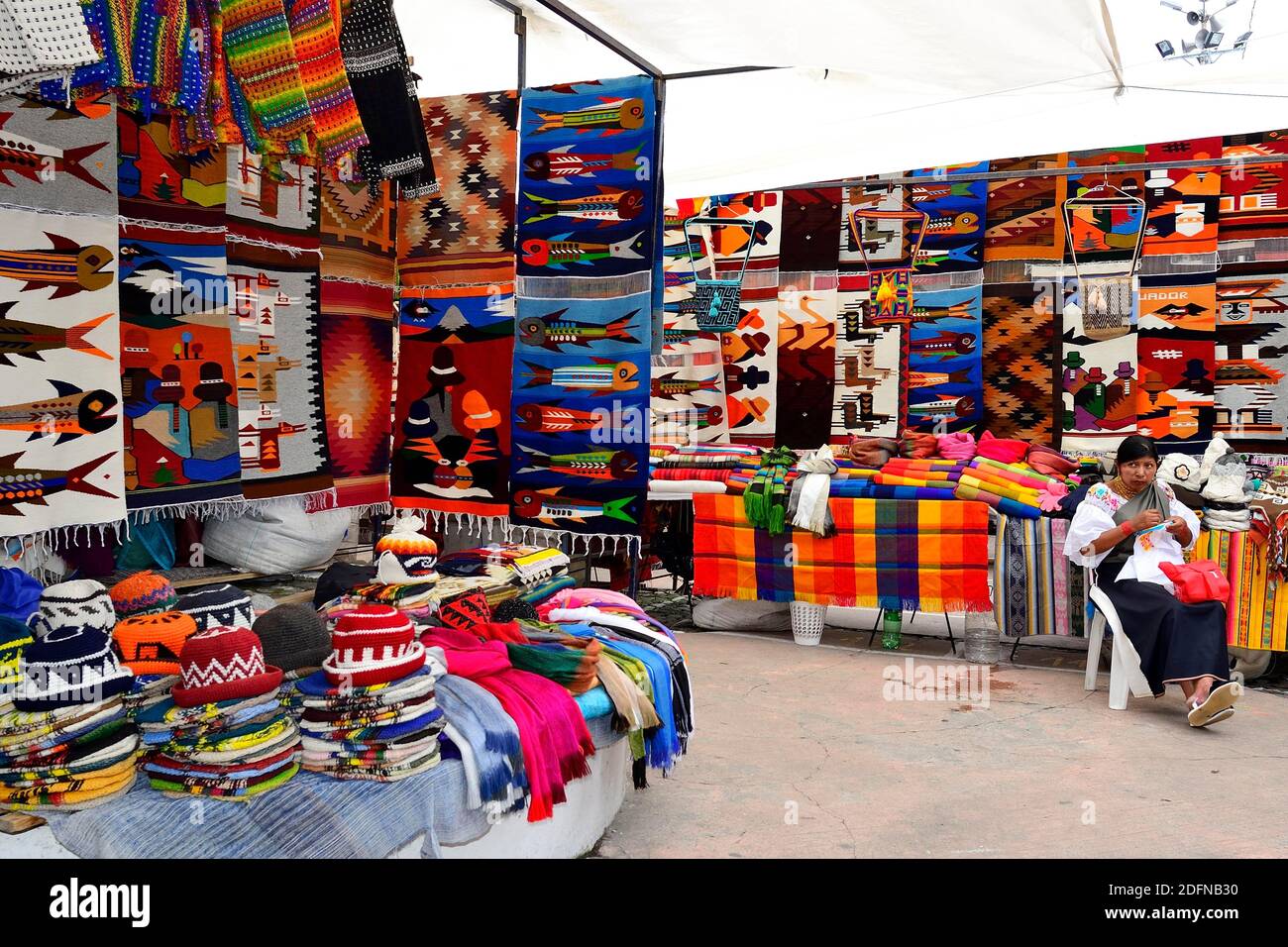 Colourful textiles at the handicraft market, Plaza de Ponchos, Otavalo ...
