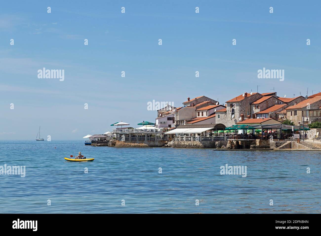 Bathing bay with old town, Umag, Istria, Croatia Stock Photo - Alamy