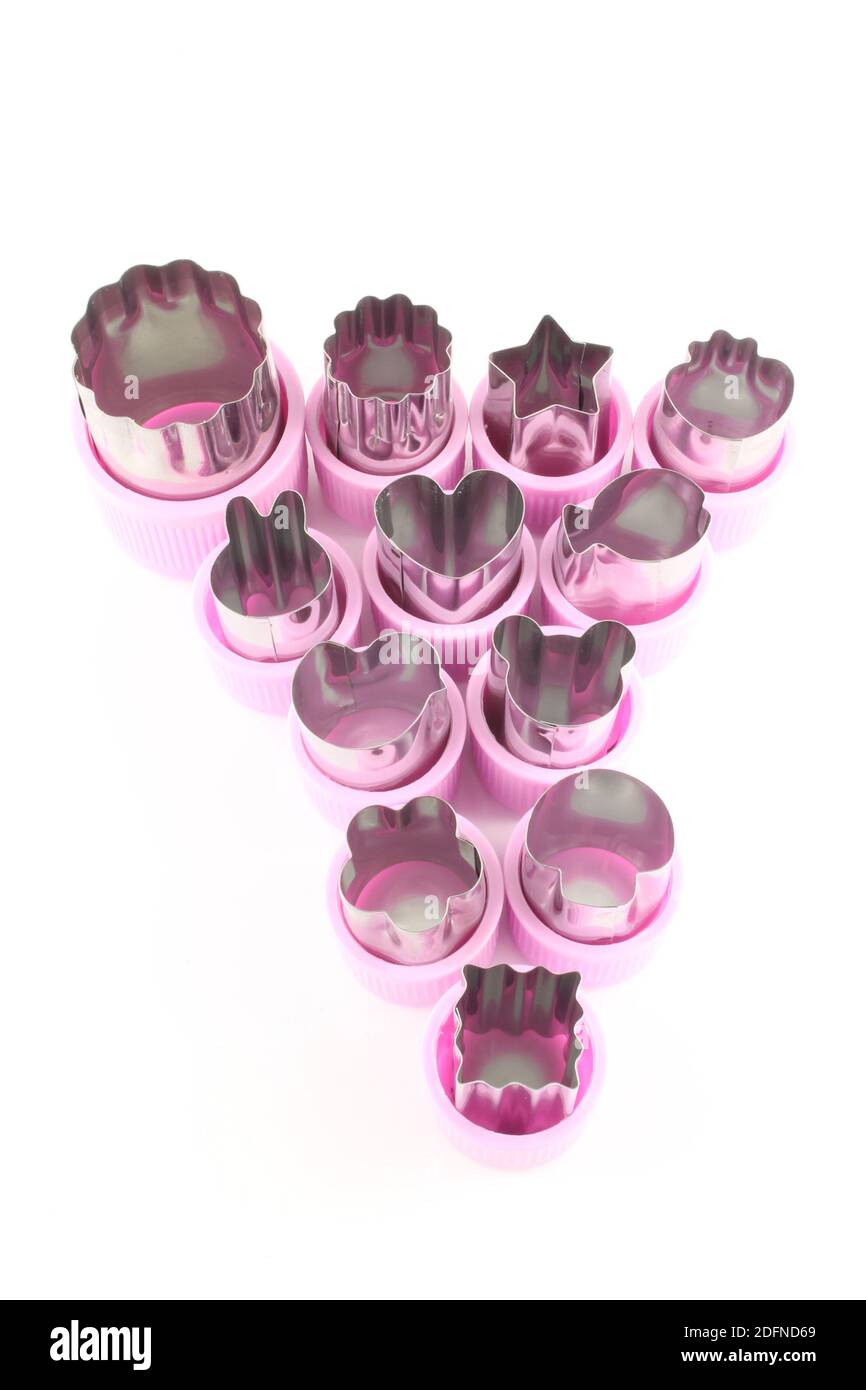 Mini cookie cutters isolated on a white background with copy space ...