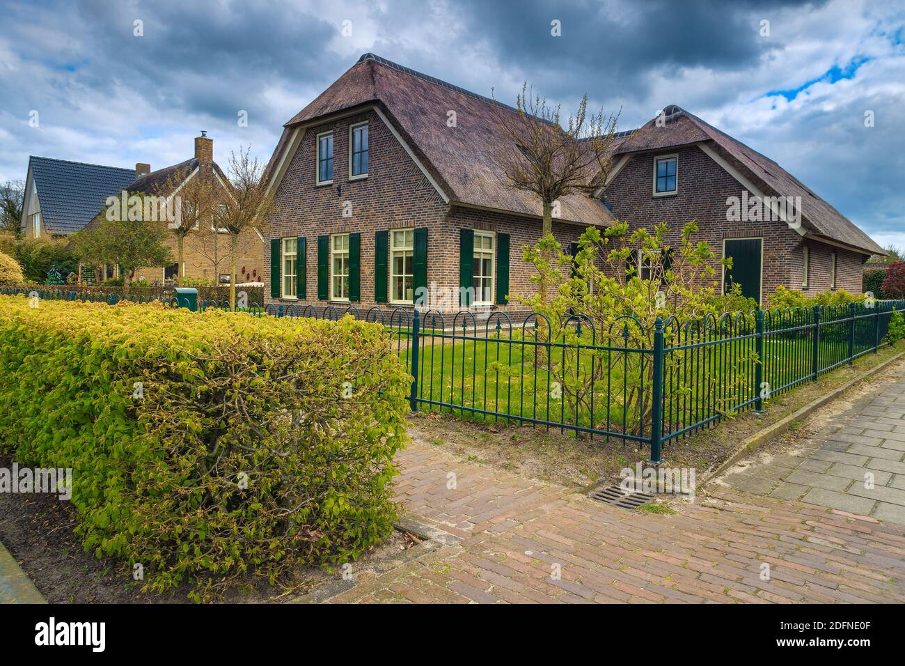 Wonderful luxury dutch house with thatched roof and orderly front yard ...