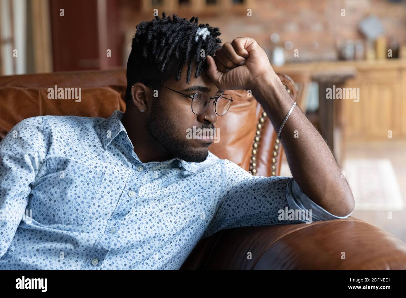 Frustrated young african ethnicity man thinking or life problems Stock ...