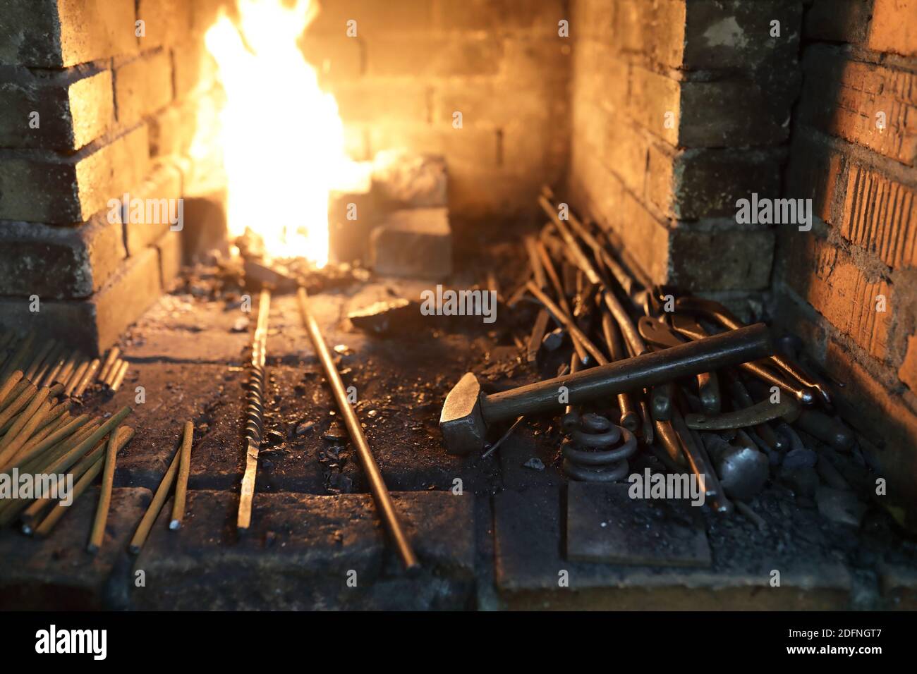 Details of blacksmithing tools in the forge Stock Photo - Alamy