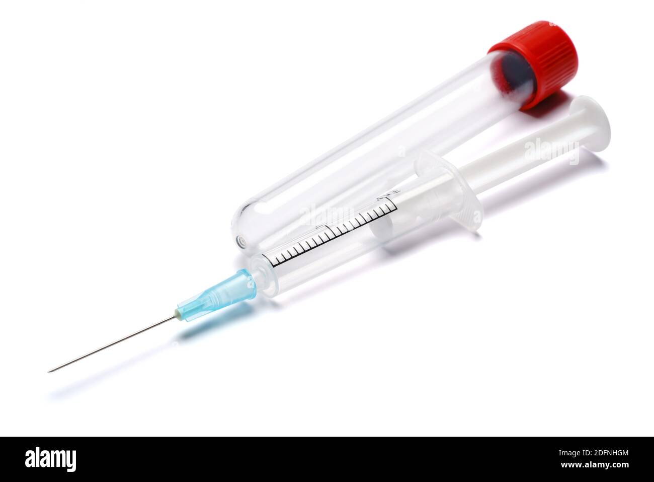 Medical syringe and plastic test tube isolated on white background ...