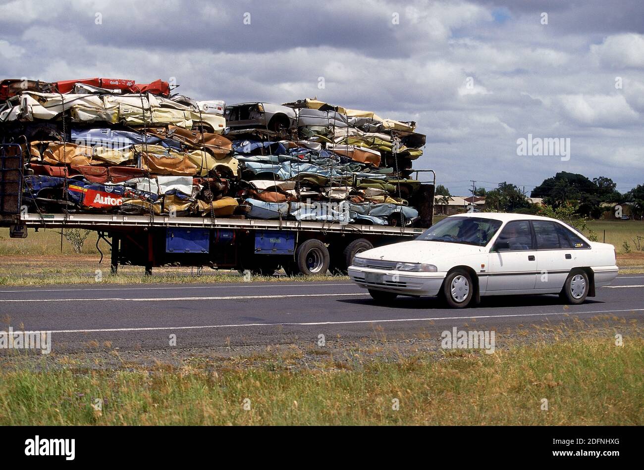 Truck with Compressed Cars going for Steel Recycling Stock Photo - Alamy