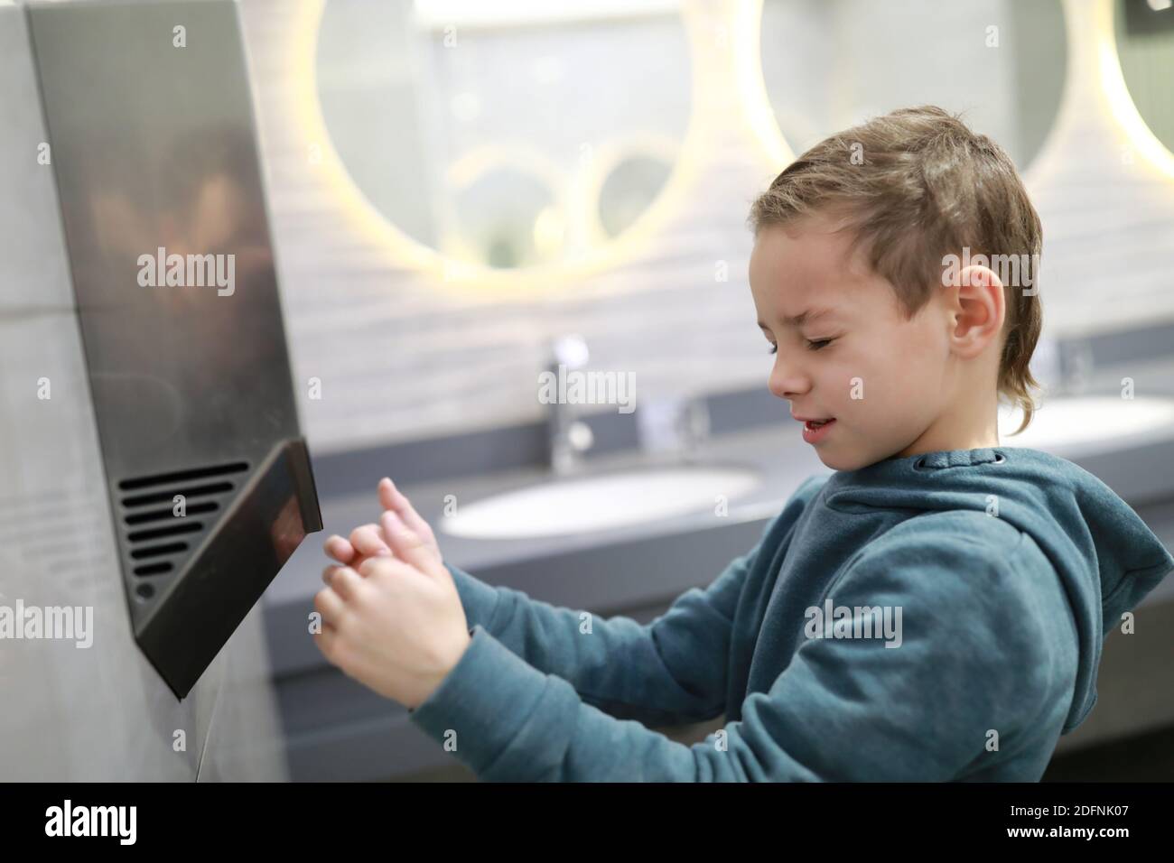 Drying hands boy hi-res stock photography and images - Alamy