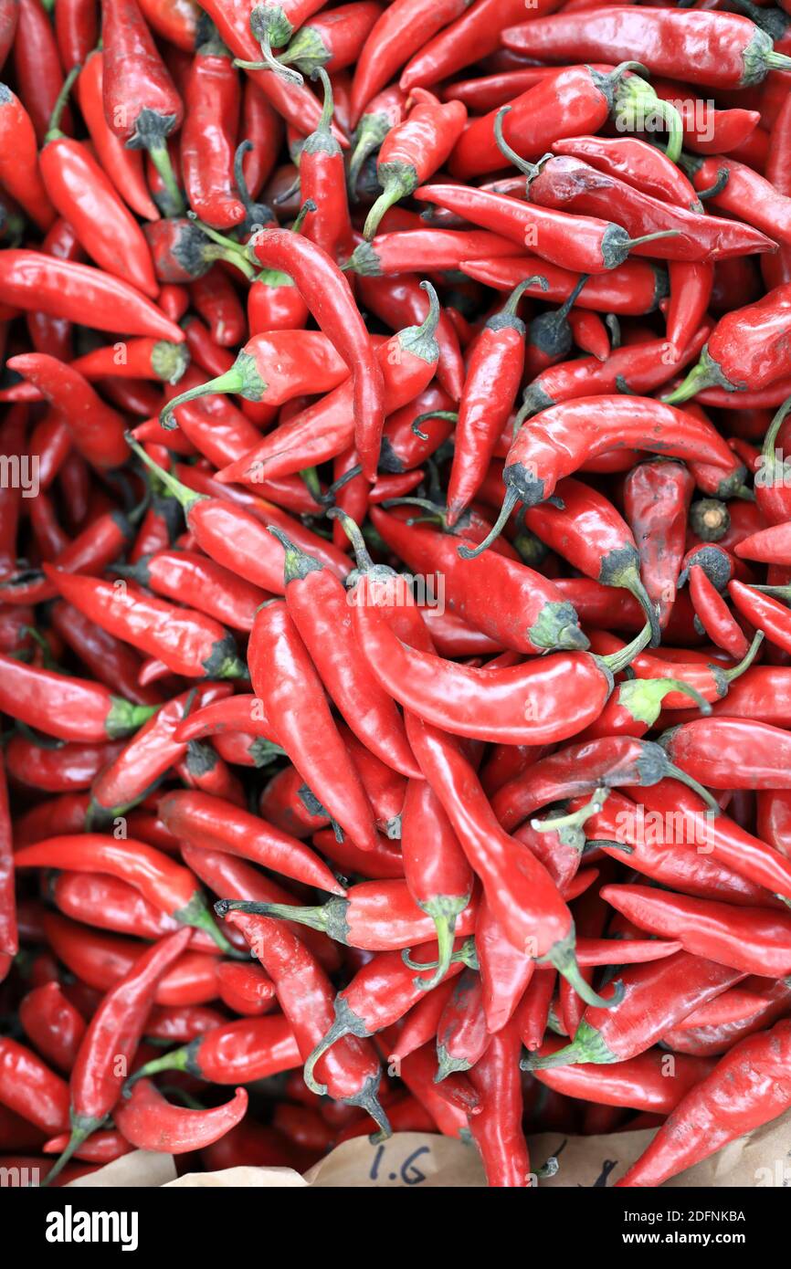 Details of red hot peppers in box on market Stock Photo - Alamy