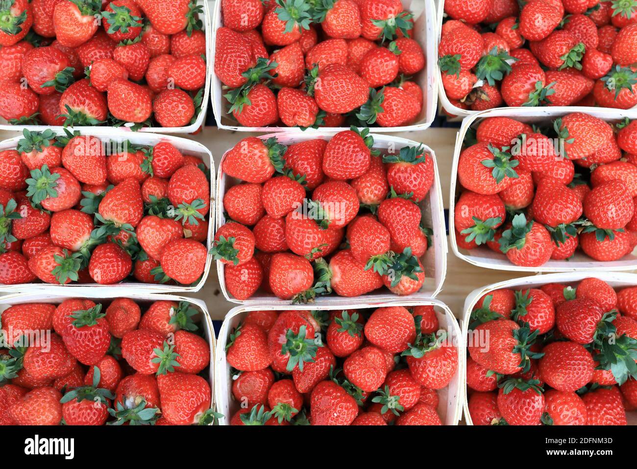 View of strawberry in boxes on the market Stock Photo - Alamy