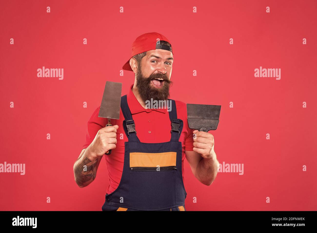 Plasterer hipster builder in cap red background. Interior designer ...