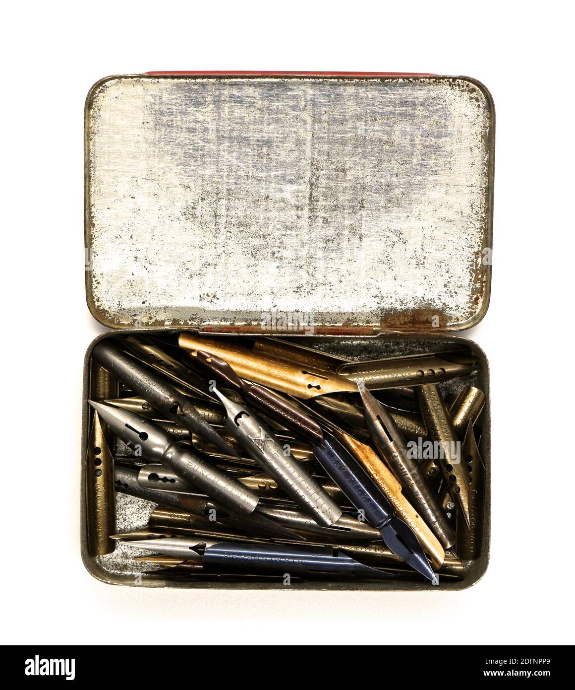 Photo of an old tin box full of old pen and ink nibs for calligraphy ...