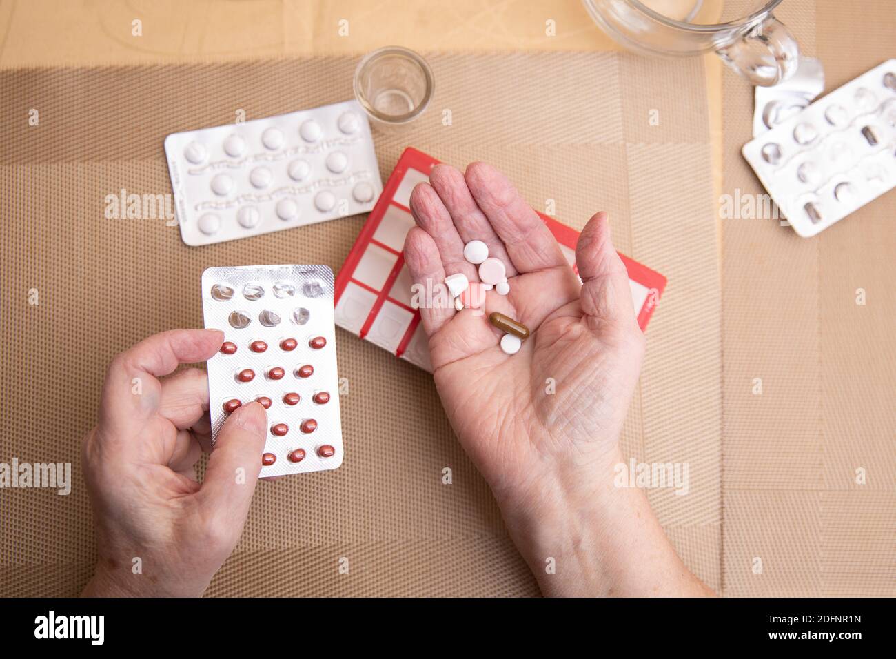Sorting Pills, Elderly Hands Sorting Pills , pills in a Senior's hands ...