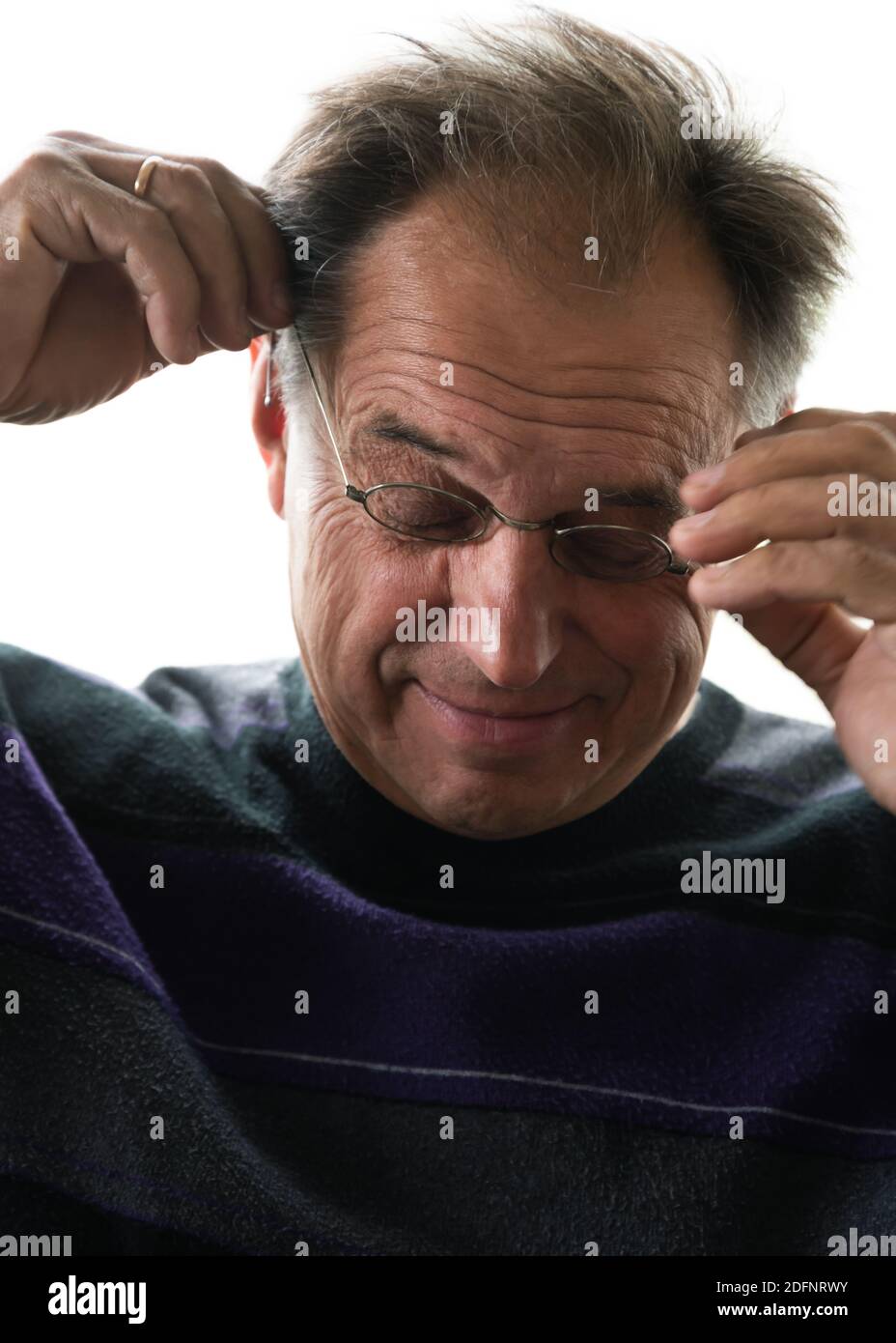 Smiling man with round old style glasses Stock Photo - Alamy