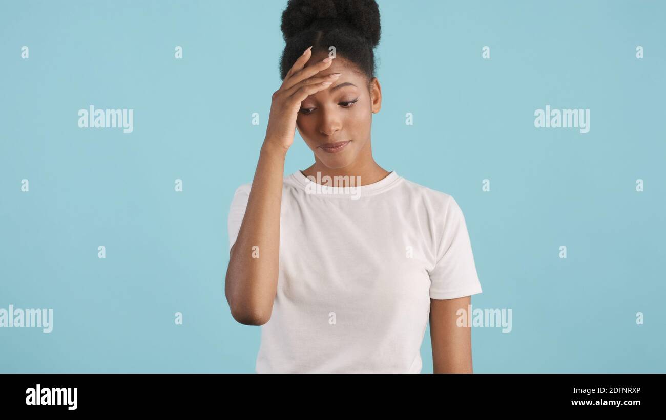 Portrait of sad casual african american girl showing face palm ...