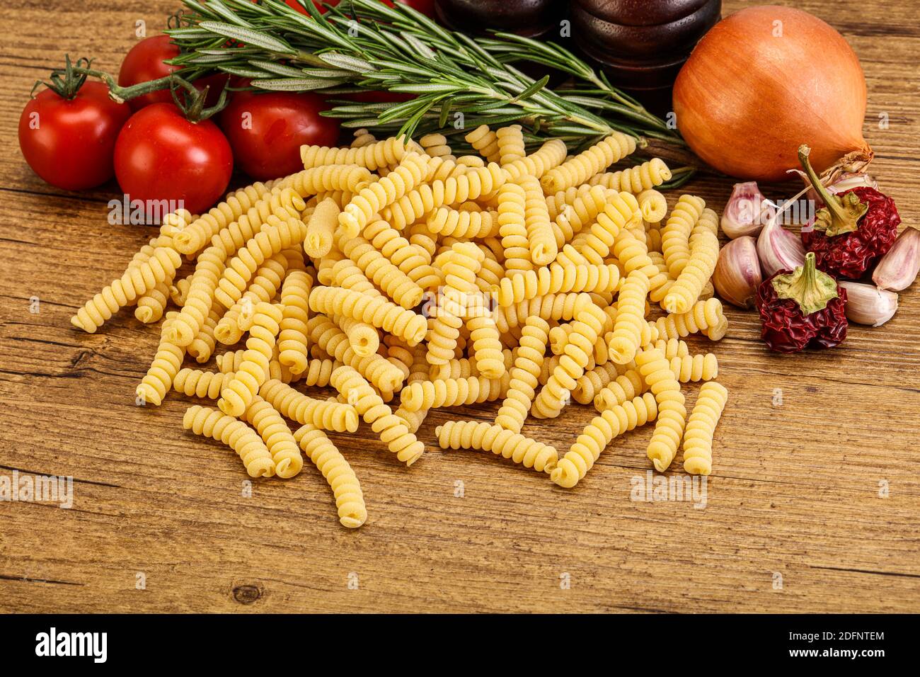 Raw Italian wheat pasta - Fusilli for cooking Stock Photo - Alamy