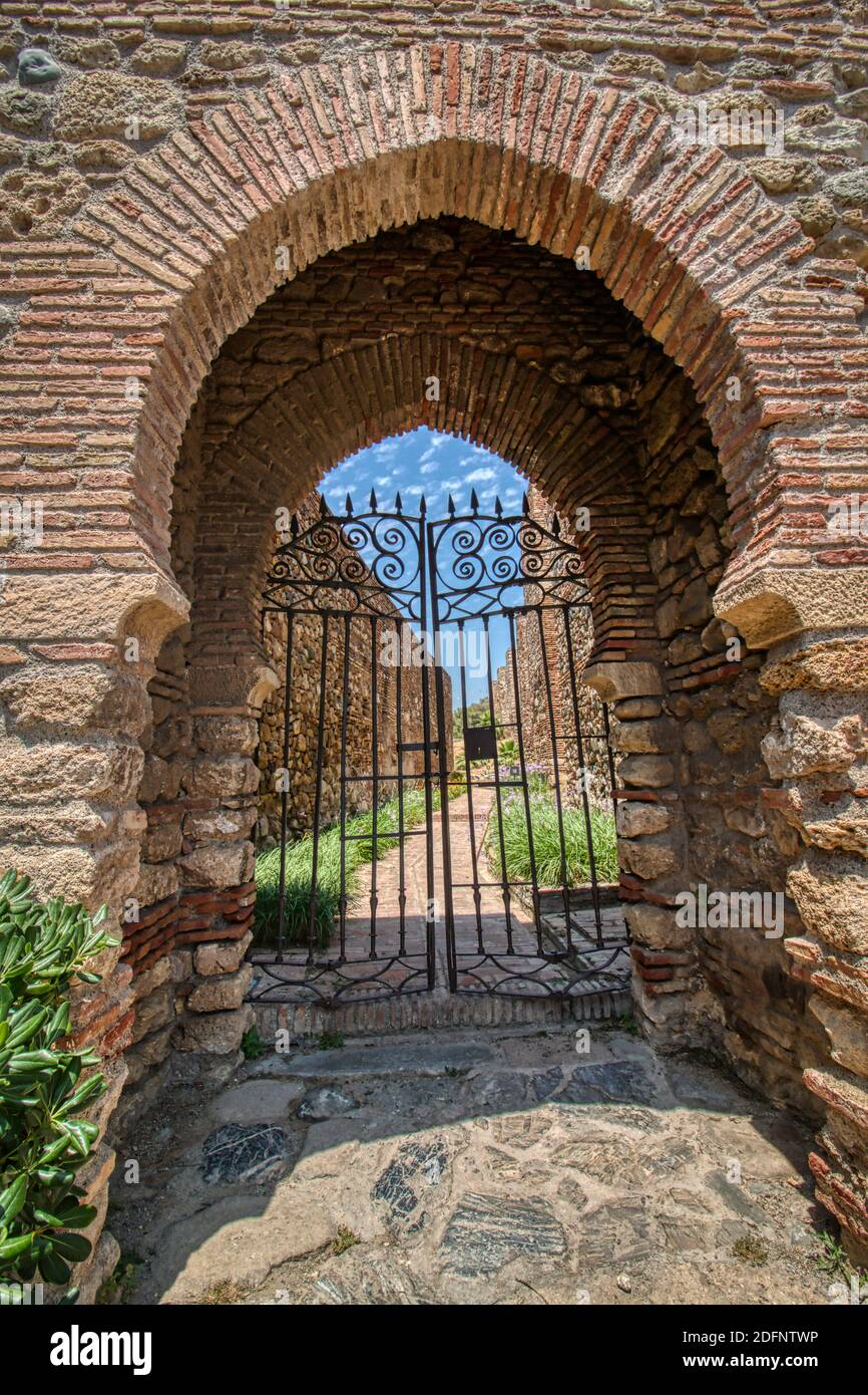 Arab architectural style door located in the Alcazaba, a palatial ...