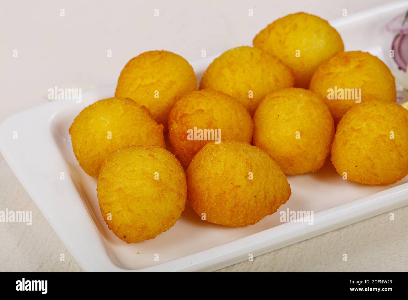 Tasty hot crispy fried potato balls Stock Photo - Alamy