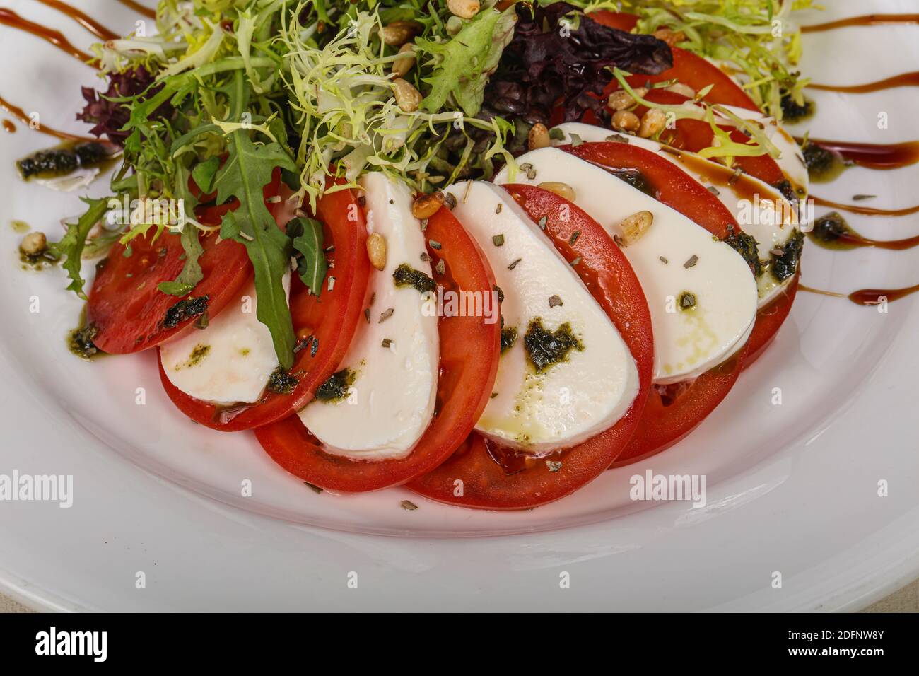Traditional Italian Caprese salad with mozarela and tomato Stock Photo ...