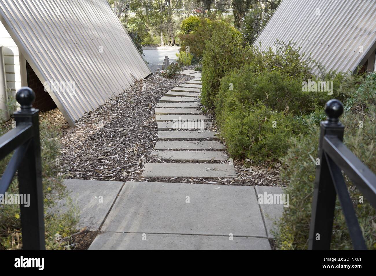Small path between the A frame houses Stock Photo - Alamy