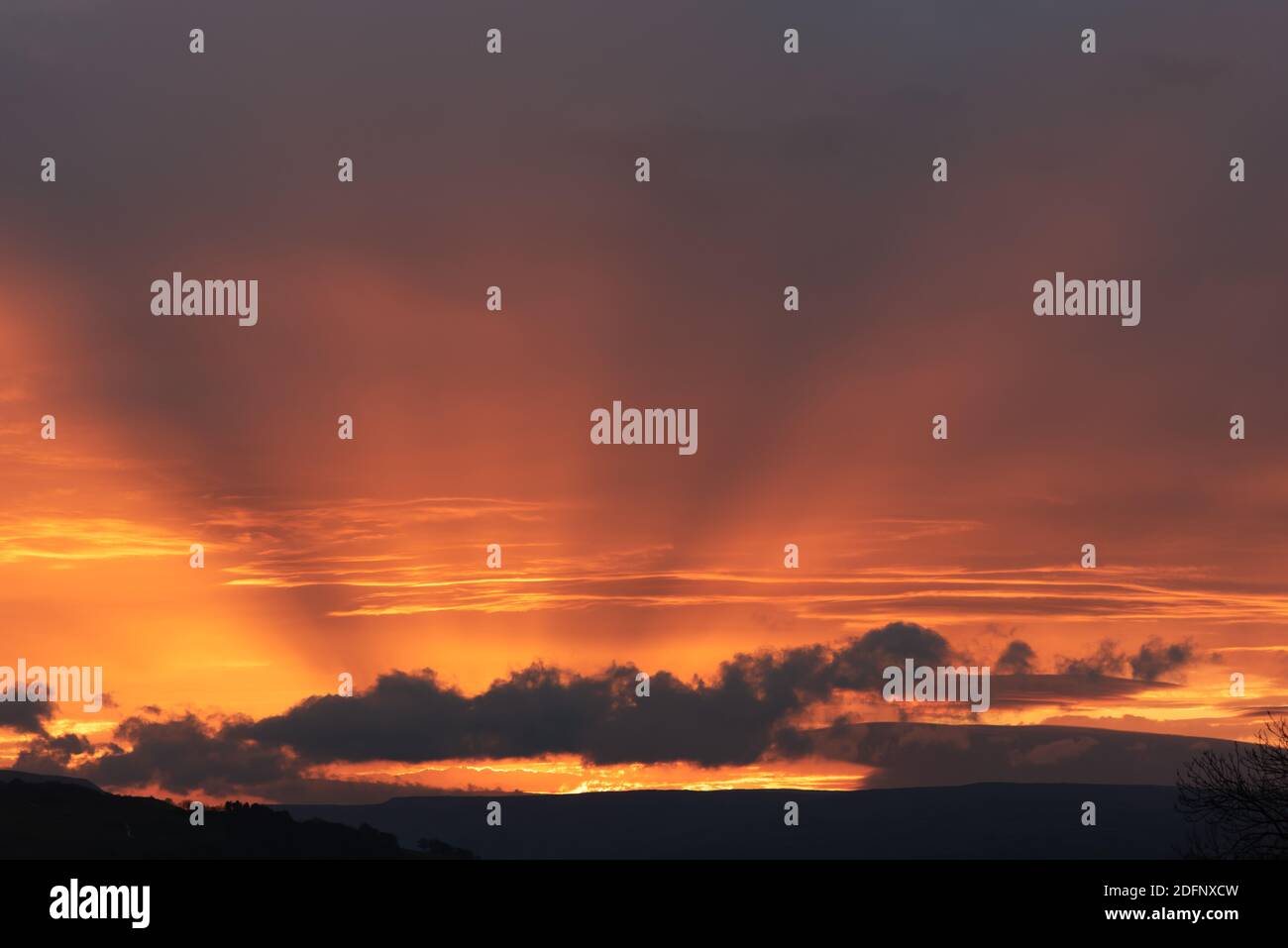 Red sunset sky rays Stock Photo - Alamy