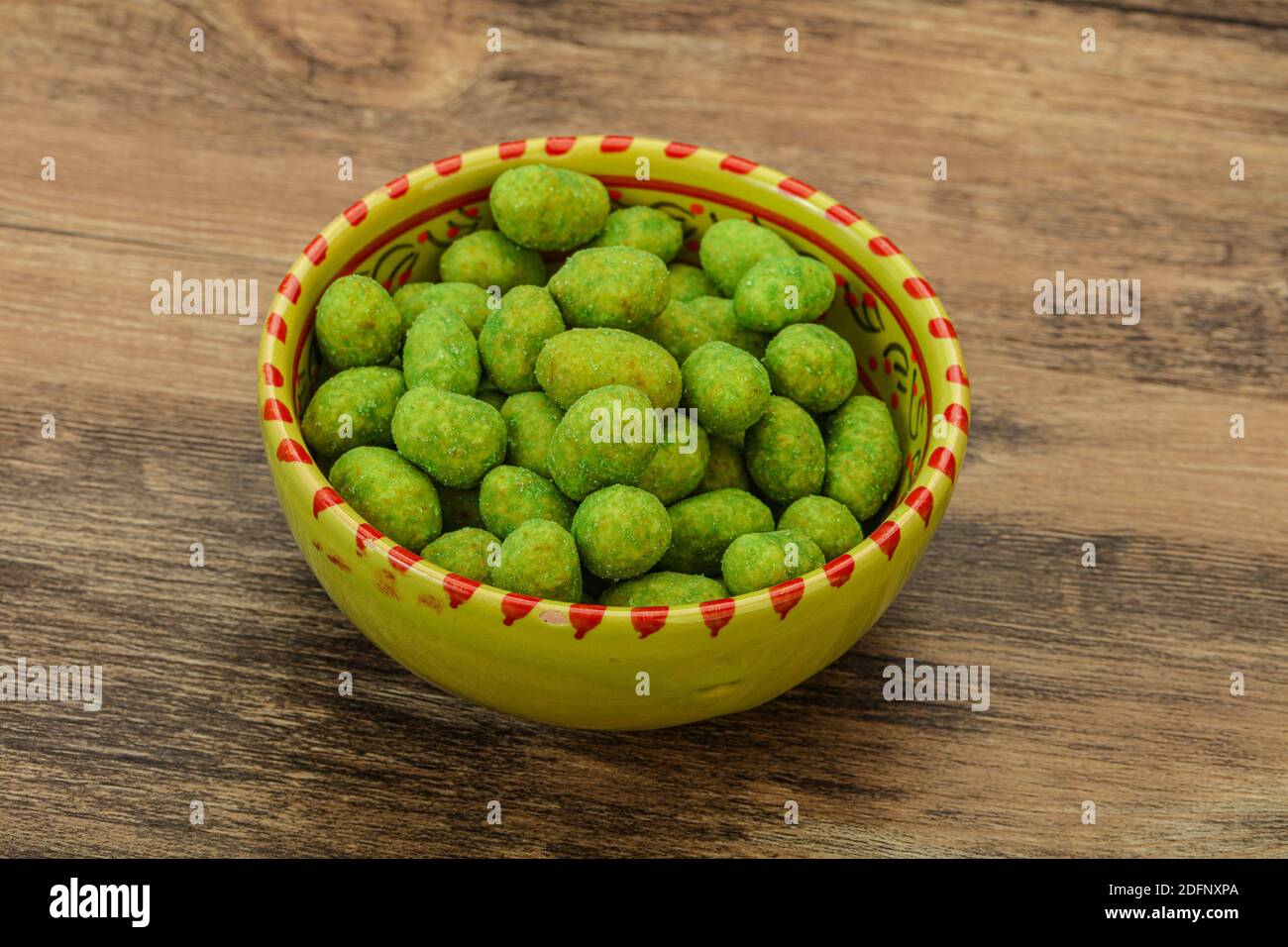 Spicy wasabi peanuts snack in the bowl Stock Photo - Alamy