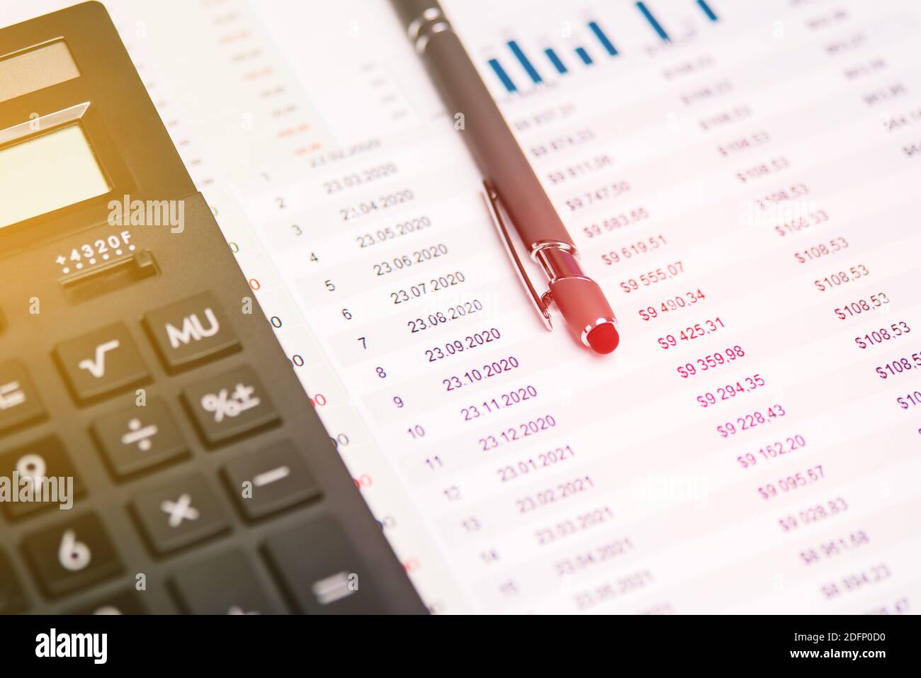 Accounting. Calculator, pen and documents with numbers at the workplace ...