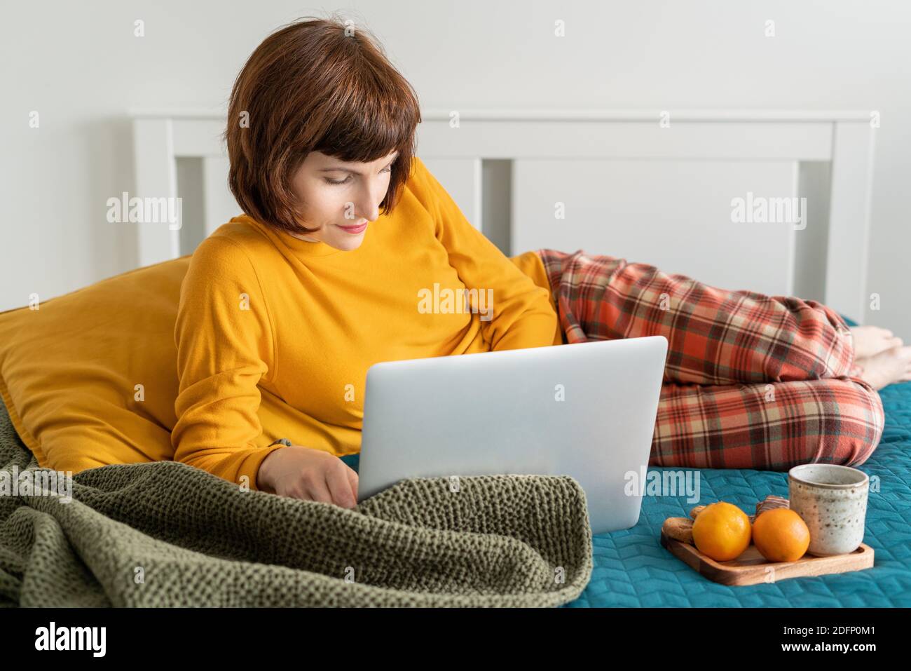 Work from home, distance learning, surfing Internet in morning after ...