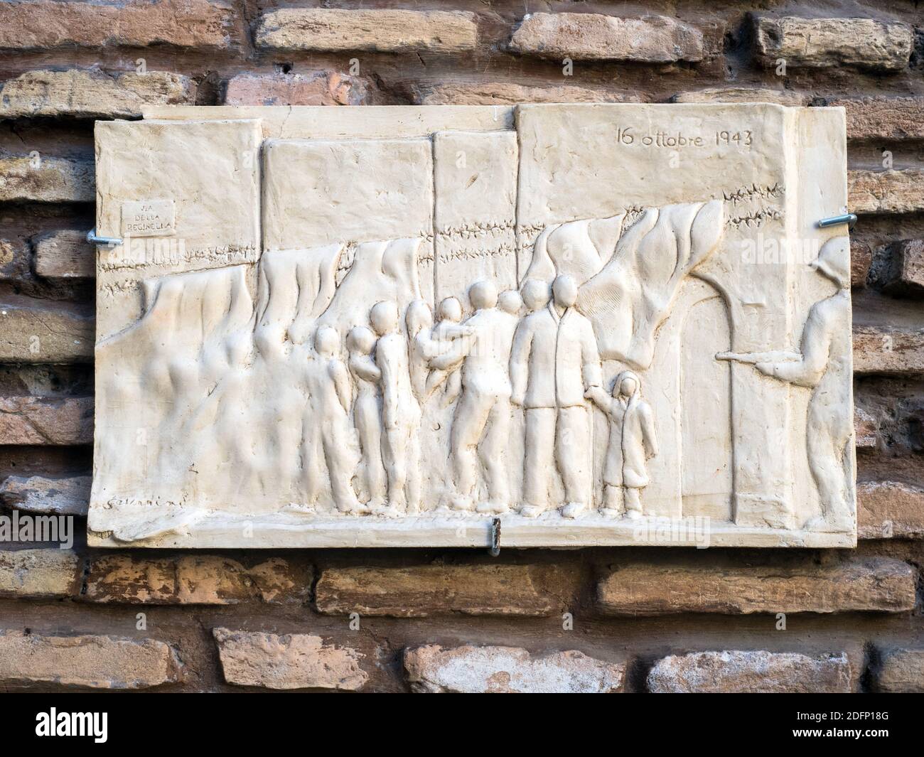 A marble plaque remembering the Jewish deportation in the roman ghetto ...