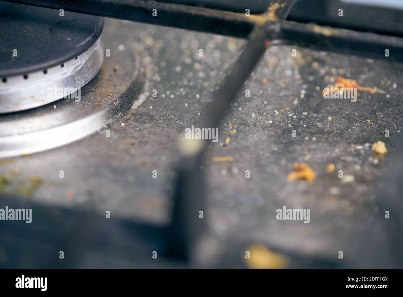 Dirty stove top with oil splatters, fat stains and food leftovers ...
