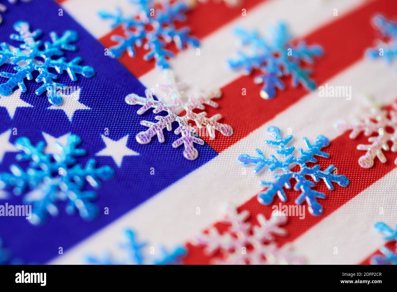Snowflakes on USA flag. American winter. Weather forecast: snowfall or ...