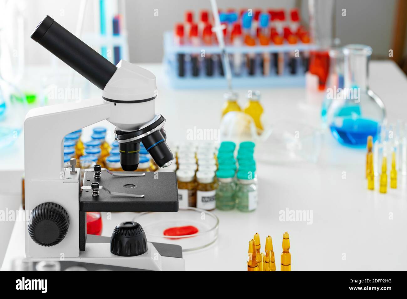 Scientific healthcare research background with microscope in medical ...