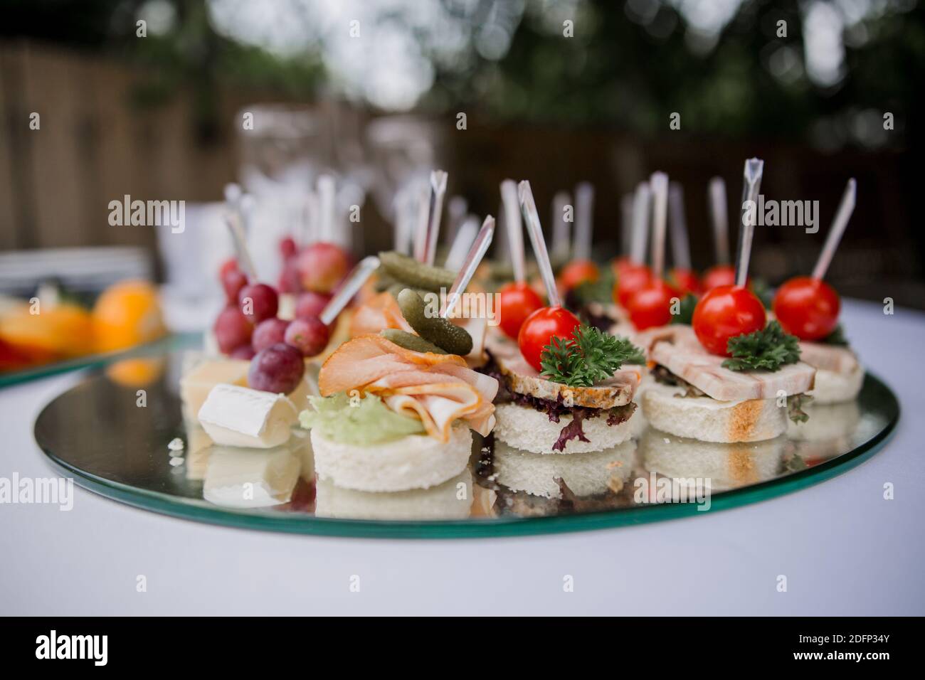 a canapé snacks on a festive table in a restaurant Stock Photo - Alamy