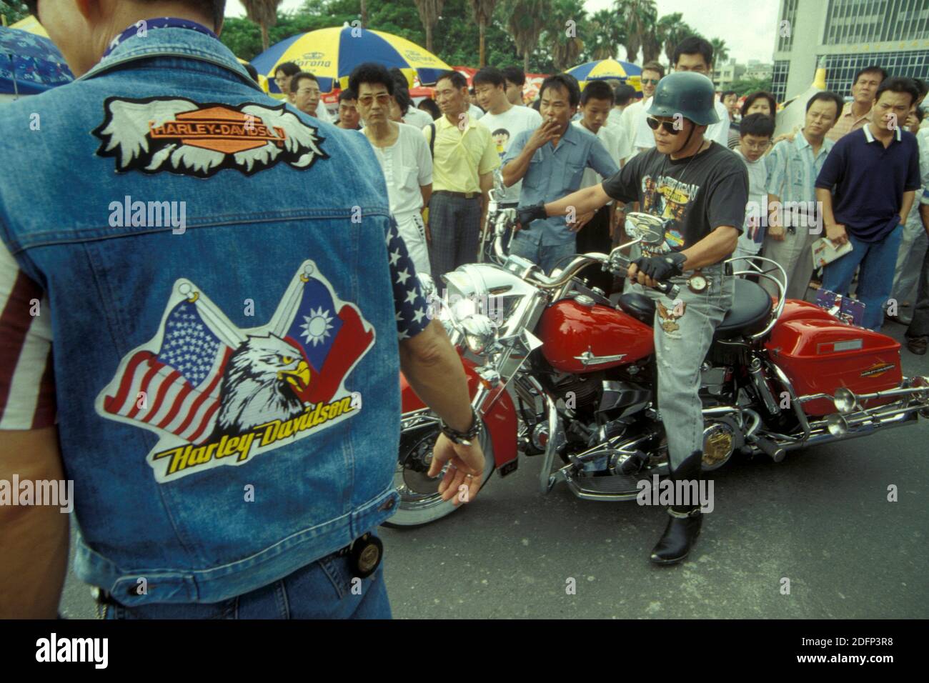 a motorbike on a road in the city centre of Taipei in Taiwan of East ...