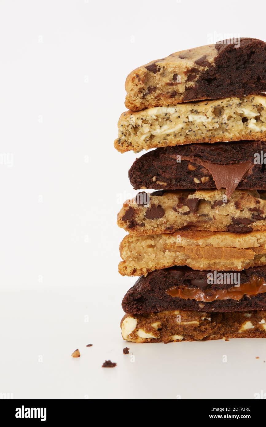 Chocolate Chip Cookie Stack with Crumbs on white background Stock Photo ...