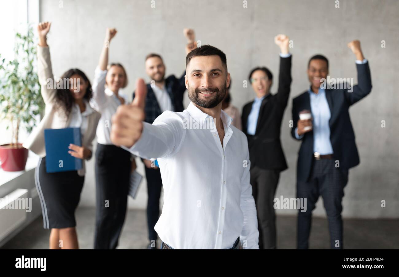 Group thumbs up employee hi-res stock photography and images - Alamy