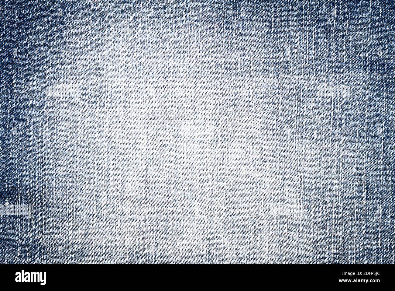 Light blue jeans texture. Denim fabric background with a seam Stock ...