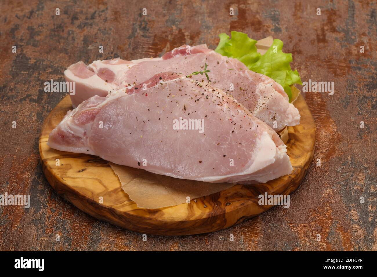 Raw pork meat steak ready for grill Stock Photo - Alamy
