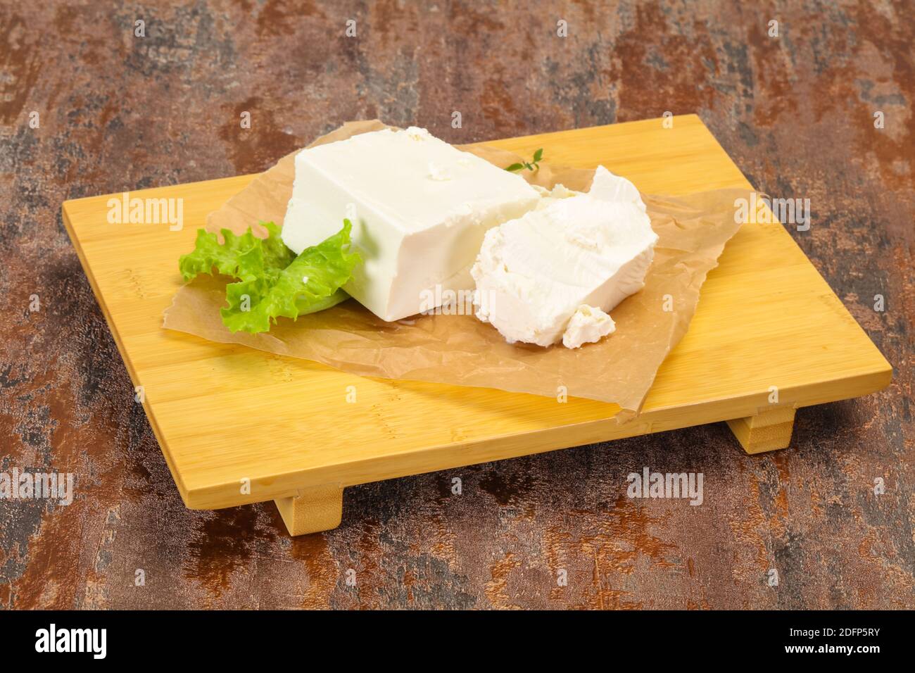 Greek traditional Feta soft cheese in the plate Stock Photo - Alamy