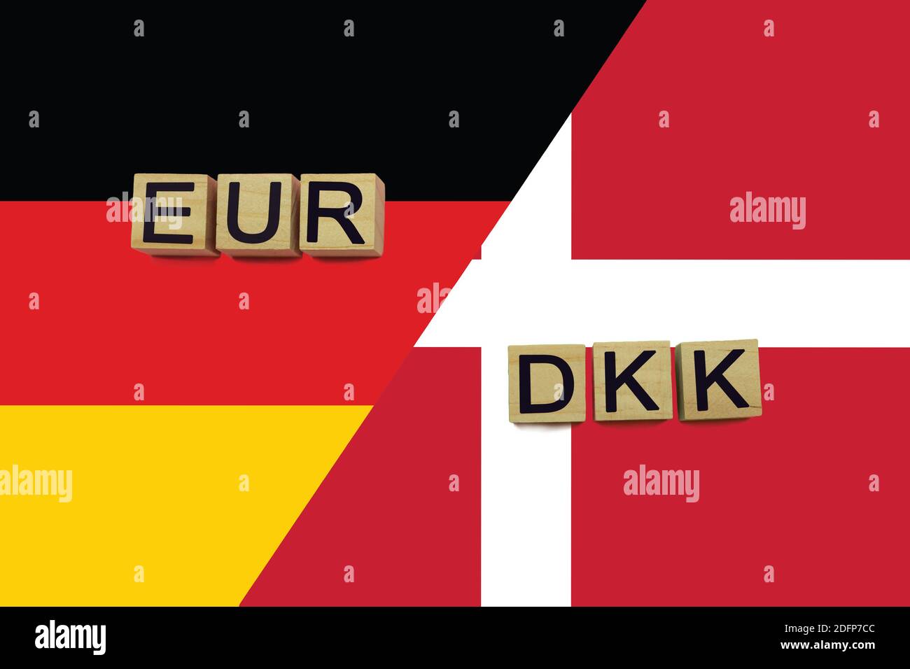 Germany and Denmark currencies codes on national flags background ...