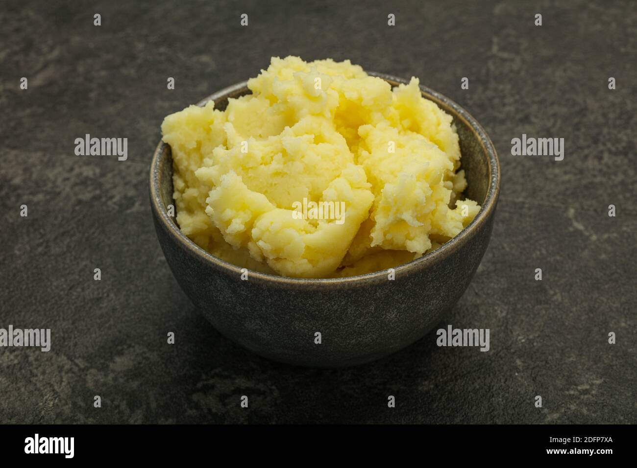 Mashed natural potato in the bowl Stock Photo - Alamy