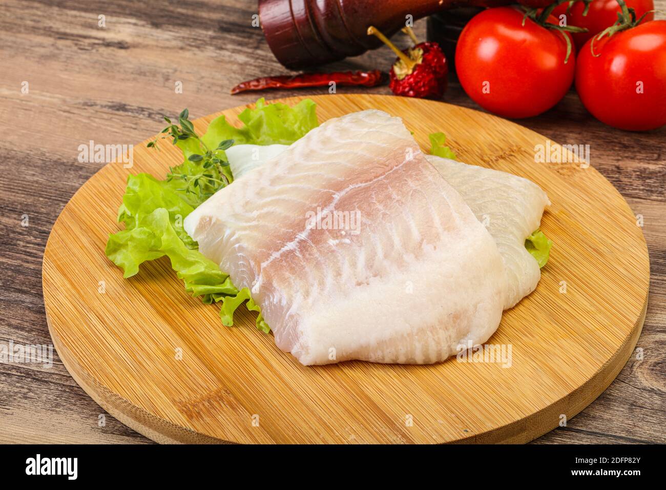 Raw pangasius fillet fish for cooking Stock Photo - Alamy