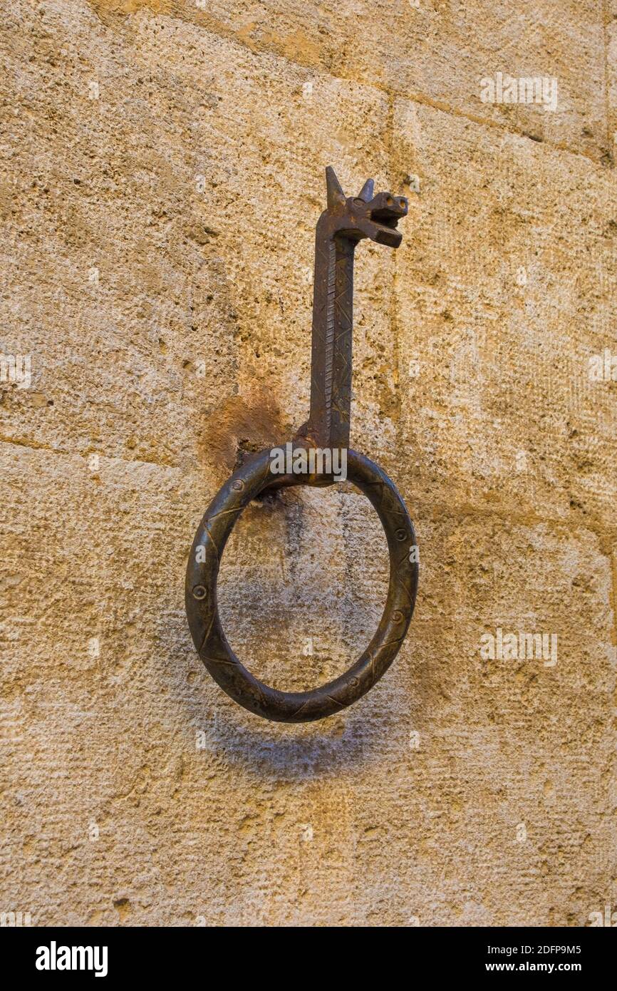 An iron ring which used to be used to tie horses to in a wall in the ...