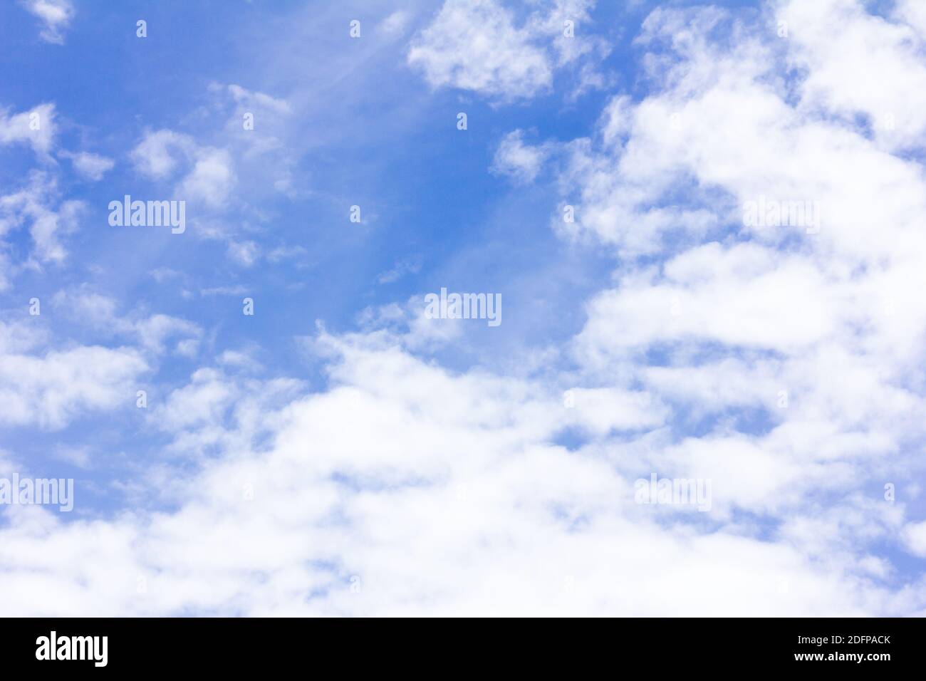 Clear blue color sky with white cloud background Stock Photo - Alamy