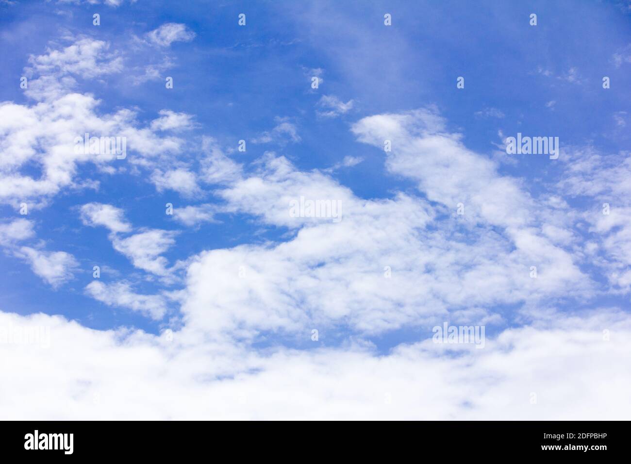Clear blue color sky with white cloud background Stock Photo - Alamy