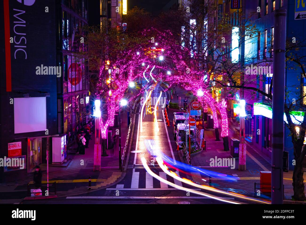 A night illuminated street in Shibuya middle shot Stock Photo - Alamy