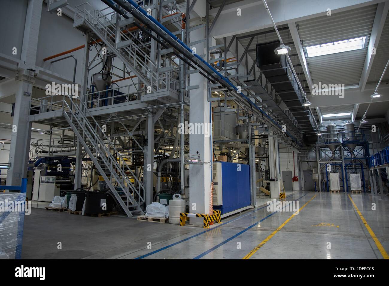 A modern factory interior with machines for manufacturin Stock Photo ...