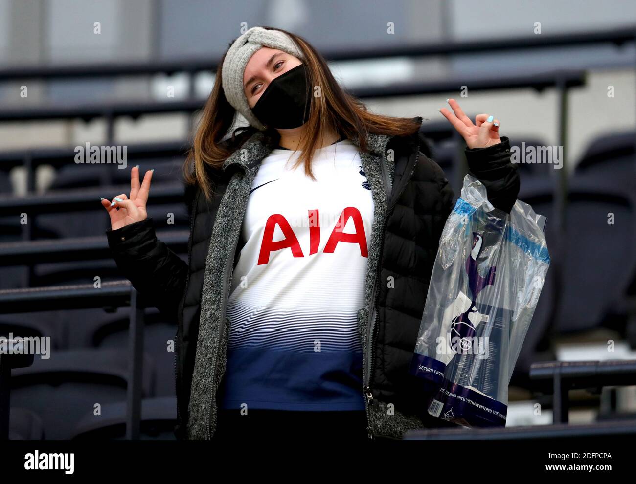 A Tottenham Hotspur fan in the stands prior to the beginning of the ...