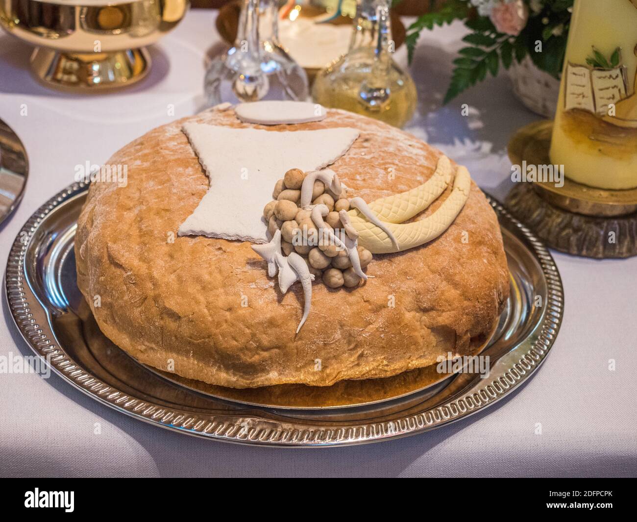 Brad - eucharistic symbolwith host during the celebration of the first ...