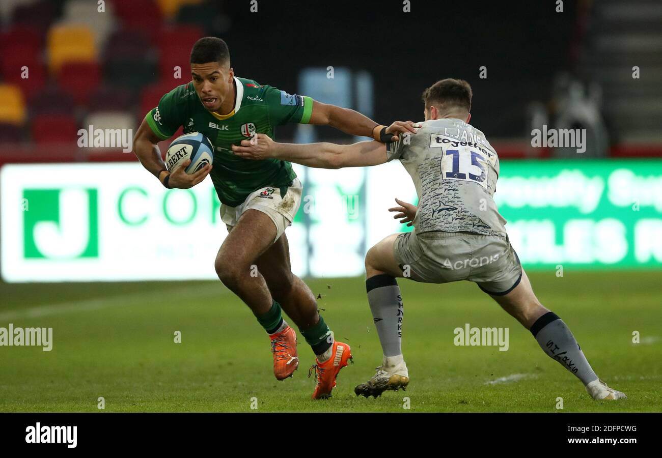 London Irish's Ben Loader (left) and Sale Sharks' Luke James during the ...