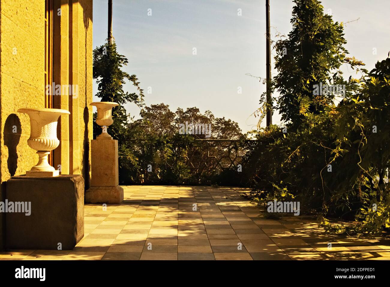 Terrace with ancient vases and greenery Stock Photo - Alamy